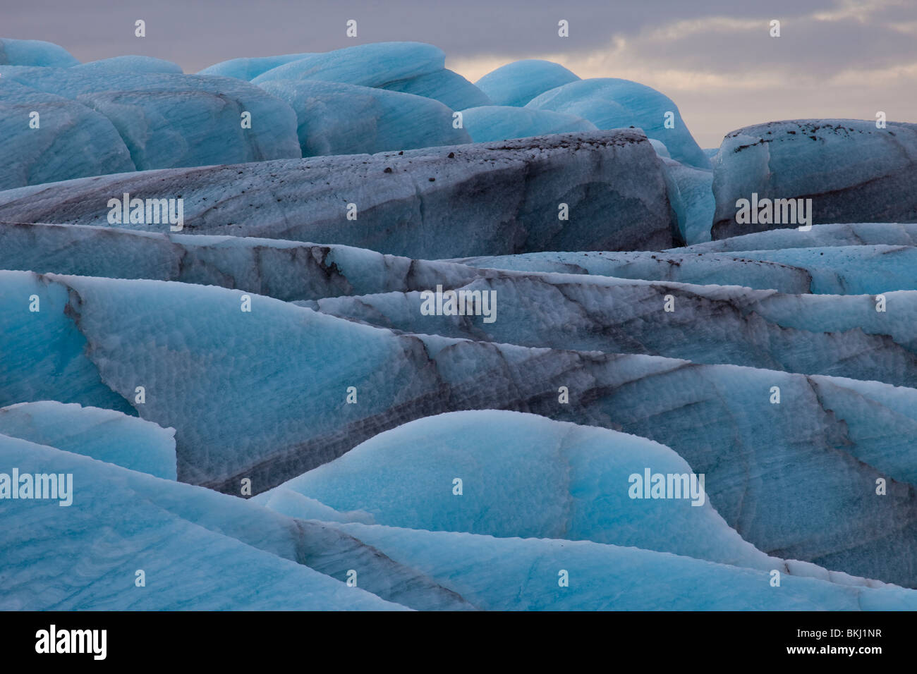 Several layers of blue ice from the glacier skaftafellsjökull in winter ...