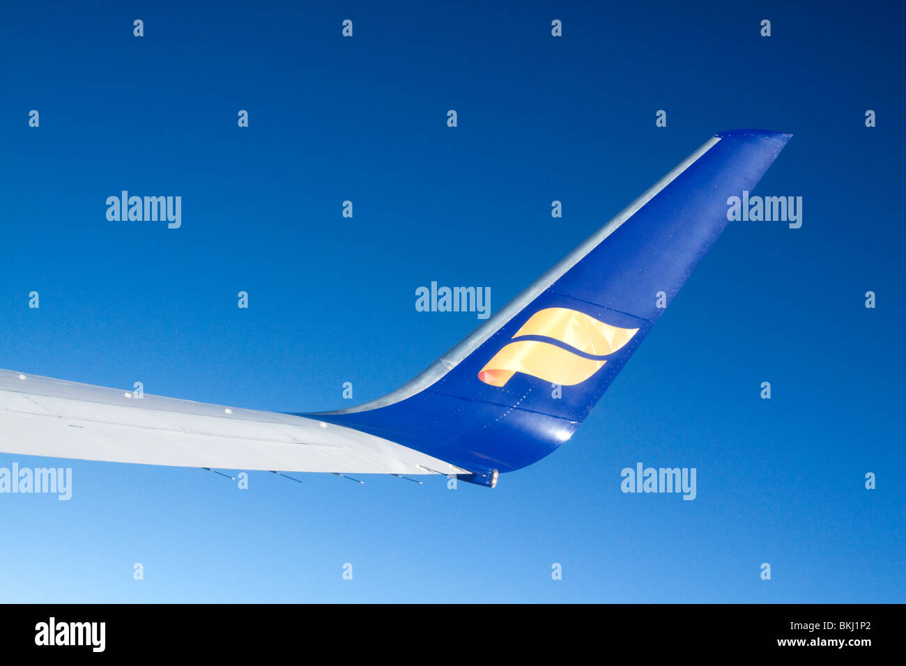 View on wing and winglet with logo of IcelandAir Boeing 757 airplane ...