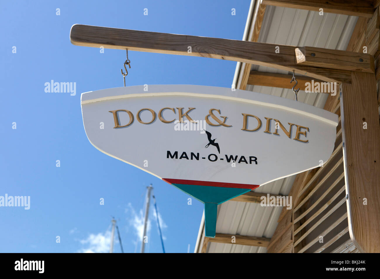Boat-shaped restaurant sign for Dock & Dine at Man O War Cay Stock ...