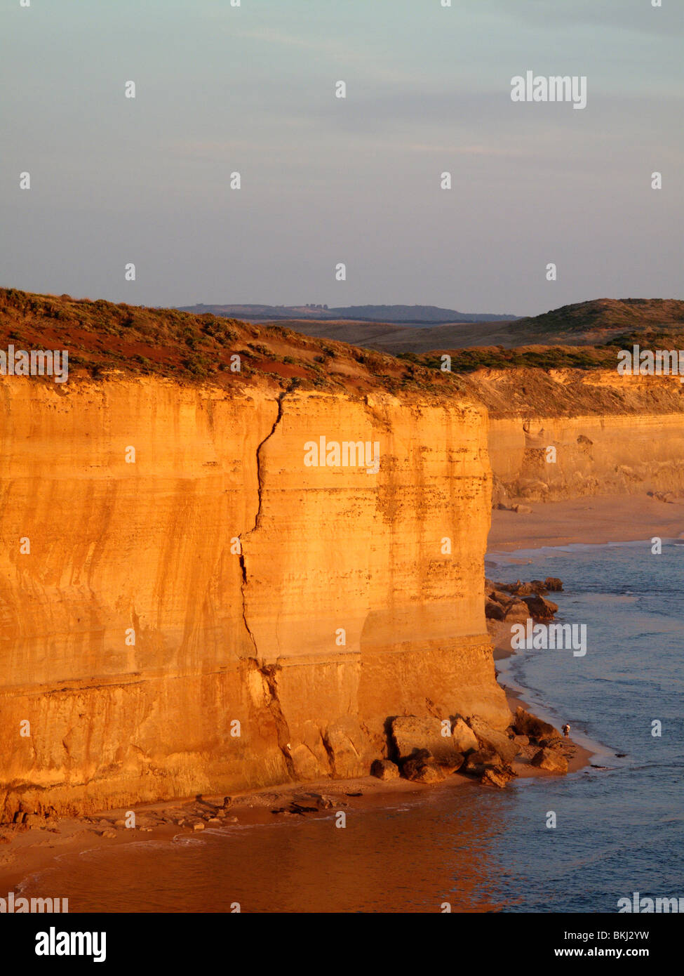 A crack in a cliff next to the Twelve Apostles rock stacks by the Great ...