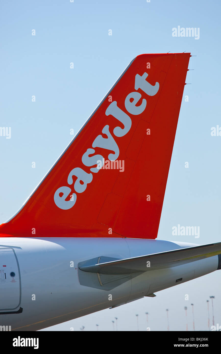The distinctive orange livery on the tailplane of an Easyjet aircraft ...