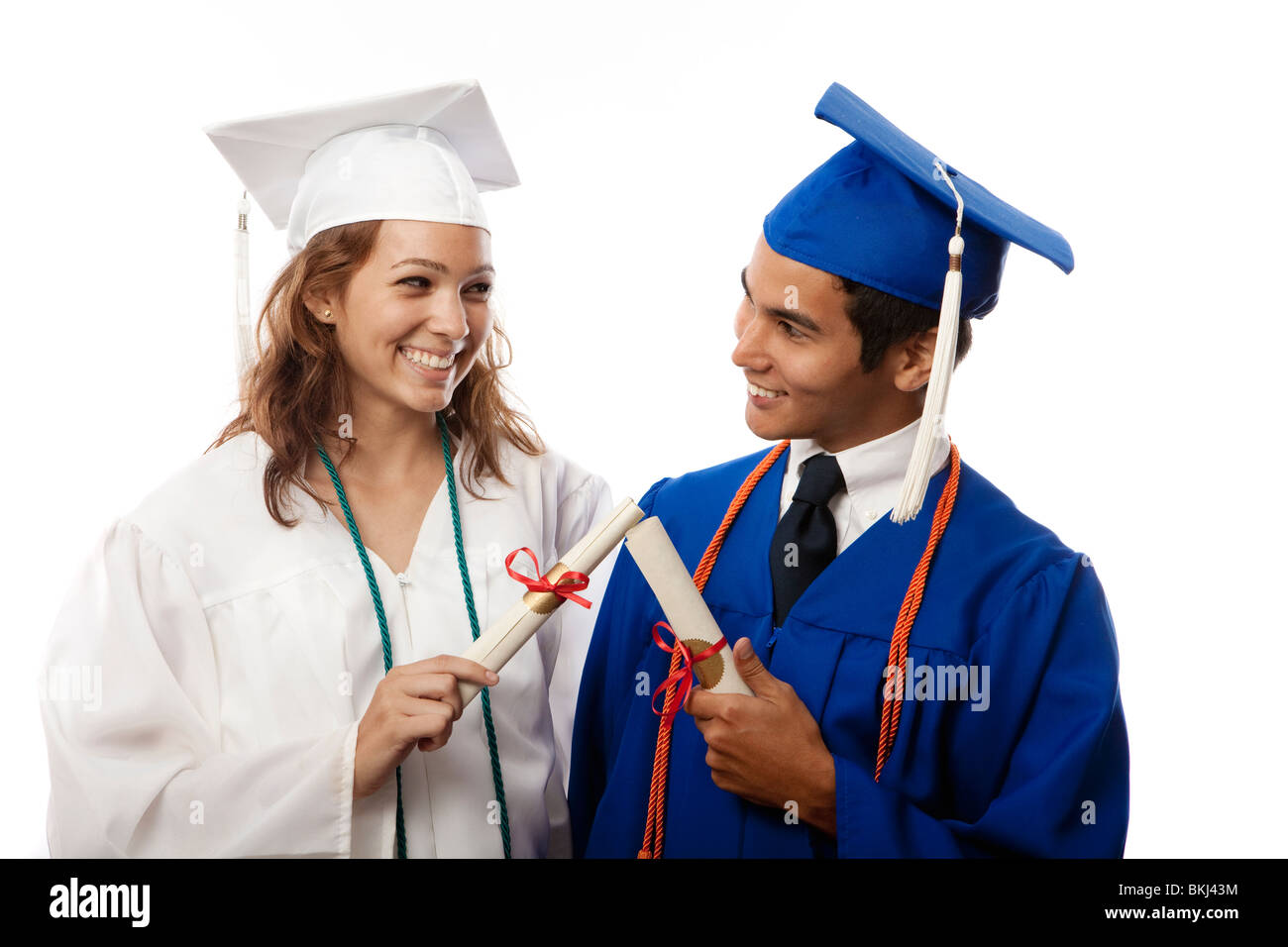 male and female college graduates in cap and gown with diploma Stock ...