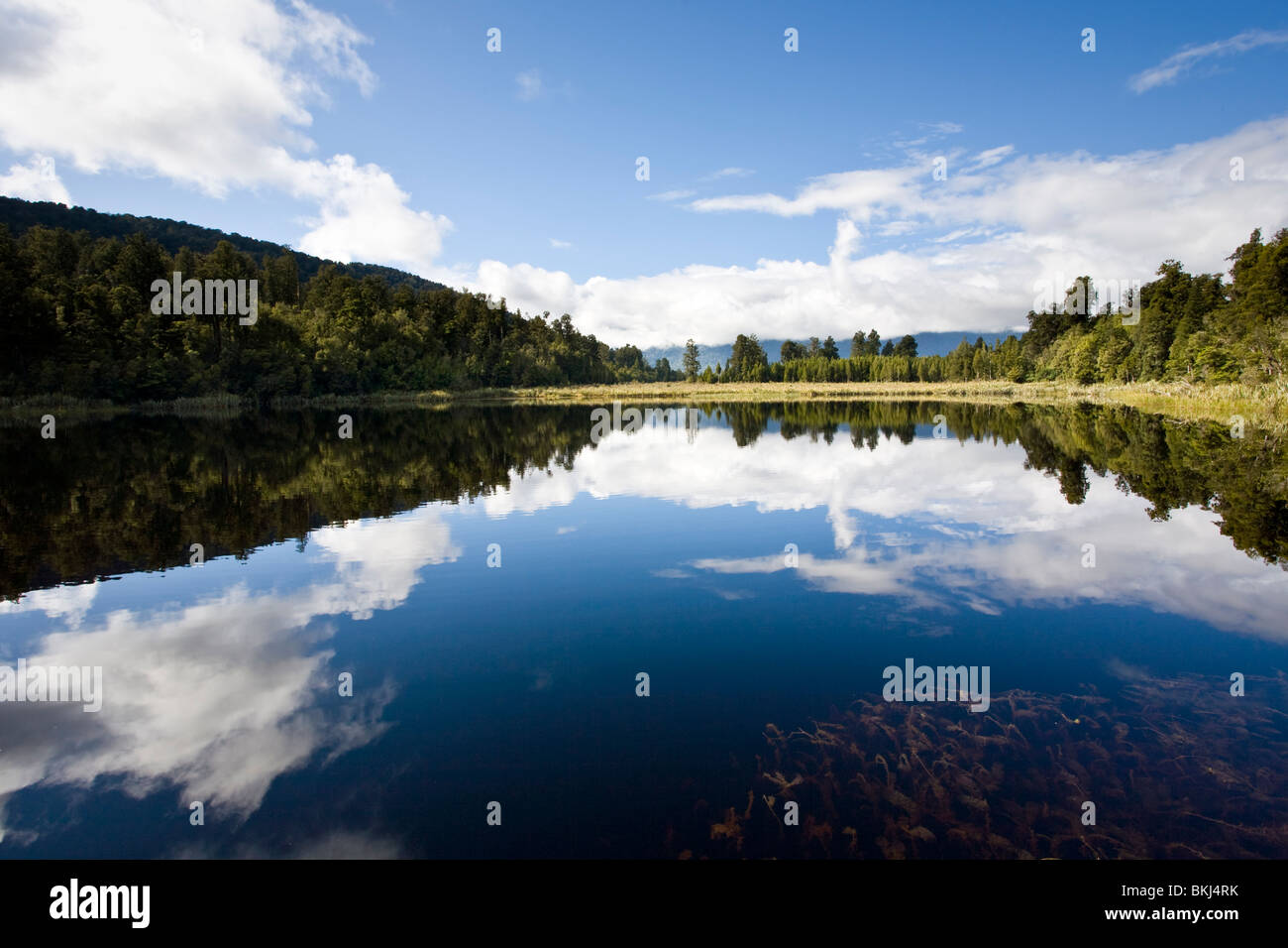 Dramatic reflections on Lake Matheson South Island New Zealand Stock ...