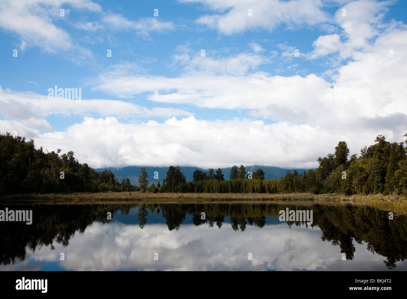Dramatic reflections on Lake Matheson South Island New Zealand Stock ...