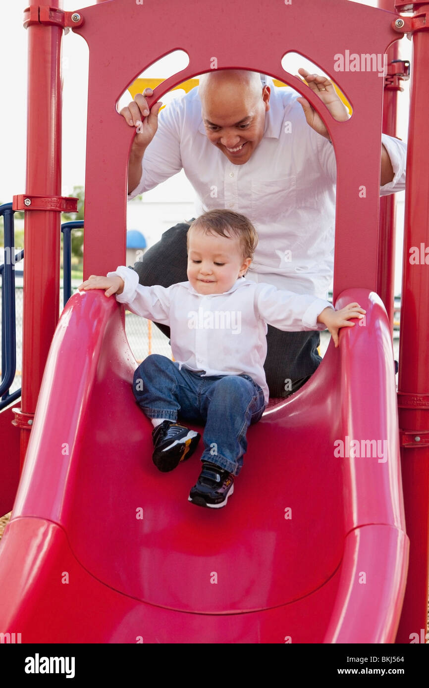 Father And Son Playing At The Playground Stock Photo - Alamy
