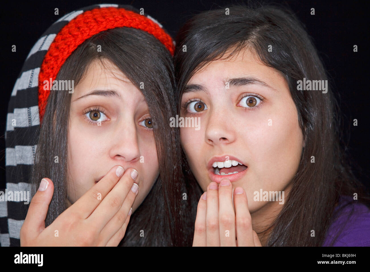 Teenage Girls With A Look Of Surprise Stock Photo - Alamy