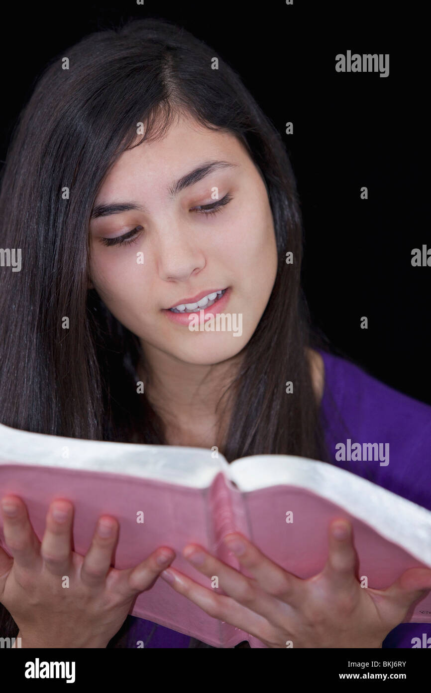 Student teen reading book smiling hi-res stock photography and images ...