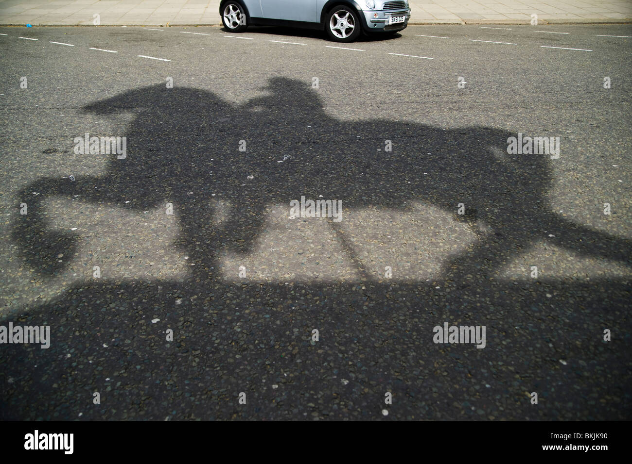Car on road shadow hi-res stock photography and images - Alamy