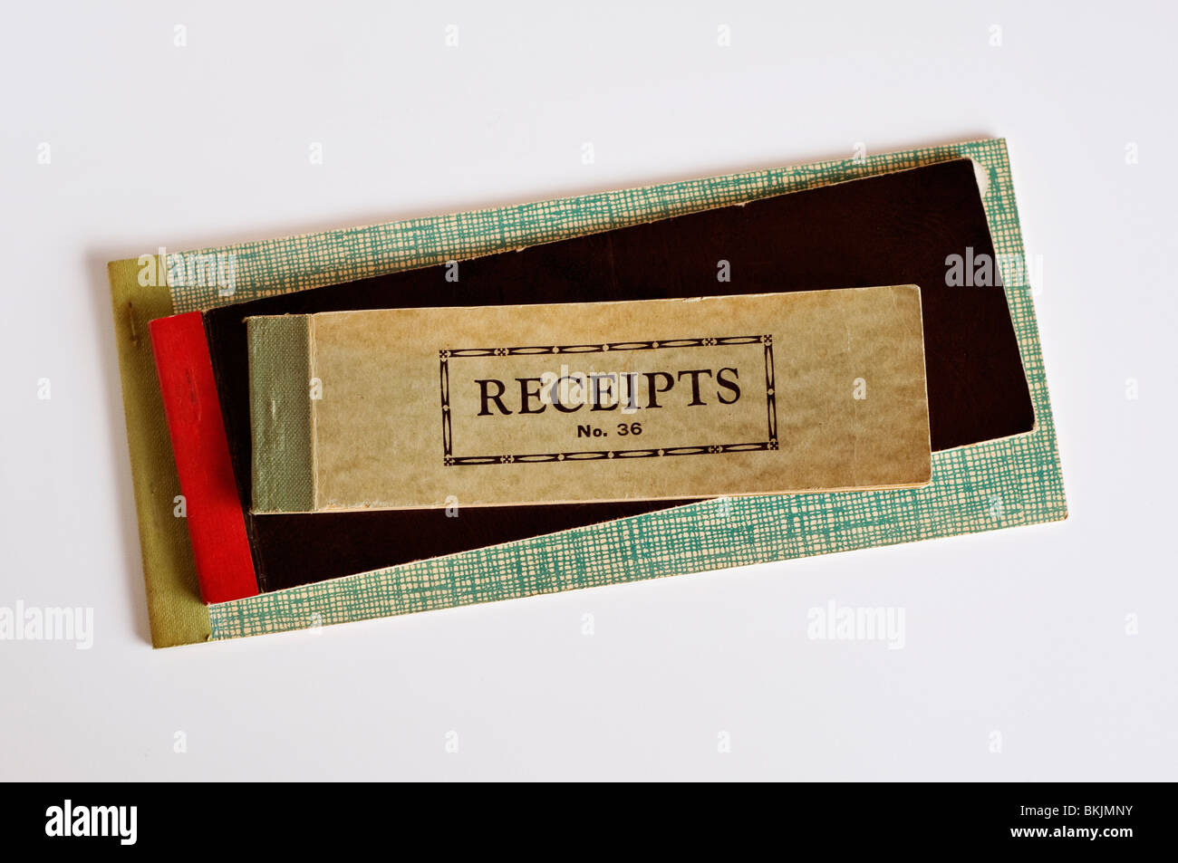 Old vintage retro receipt books on white background Stock Photo - Alamy