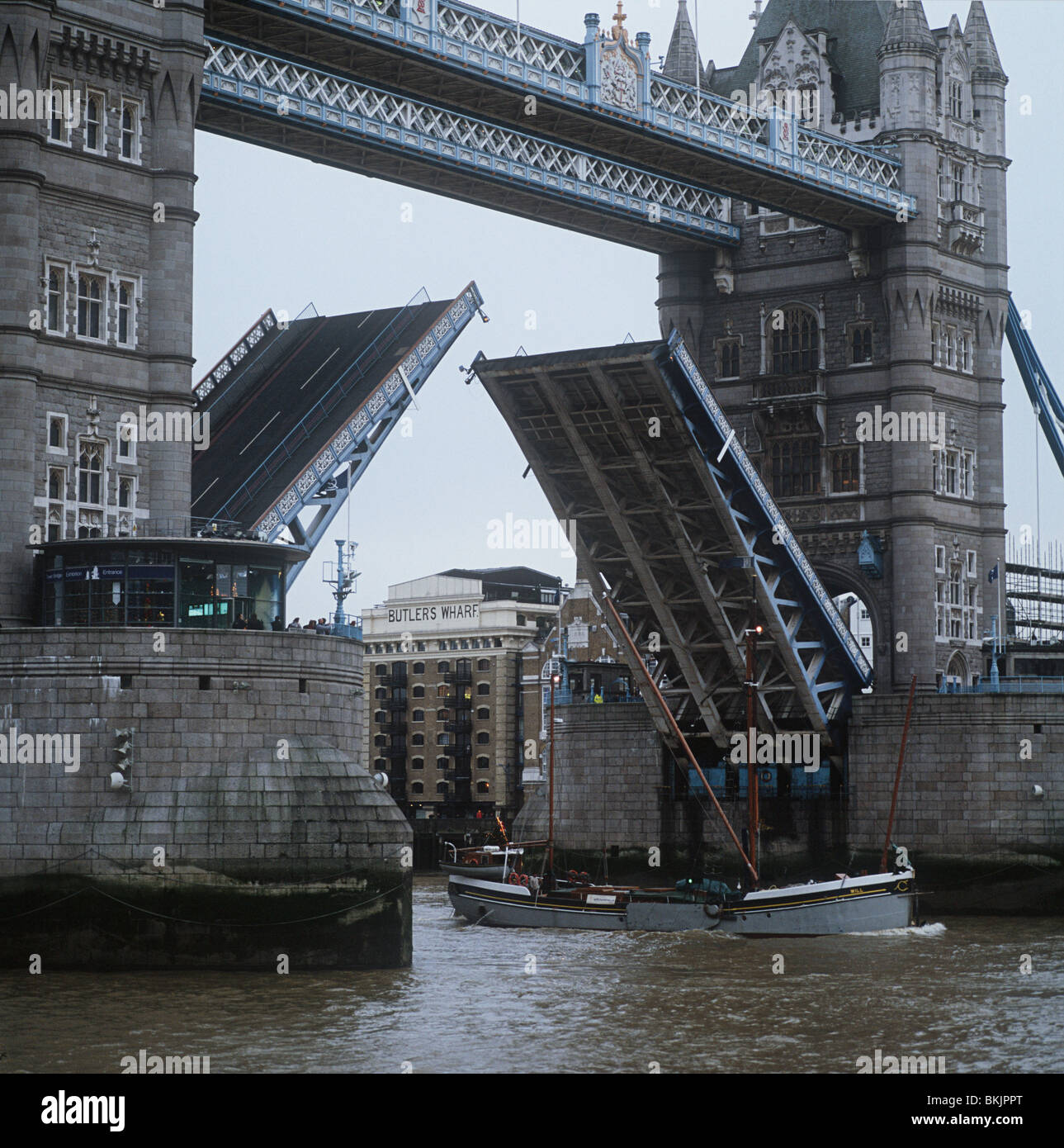 England, London, Boat passing under open Tower Bridge Stock Photo - Alamy