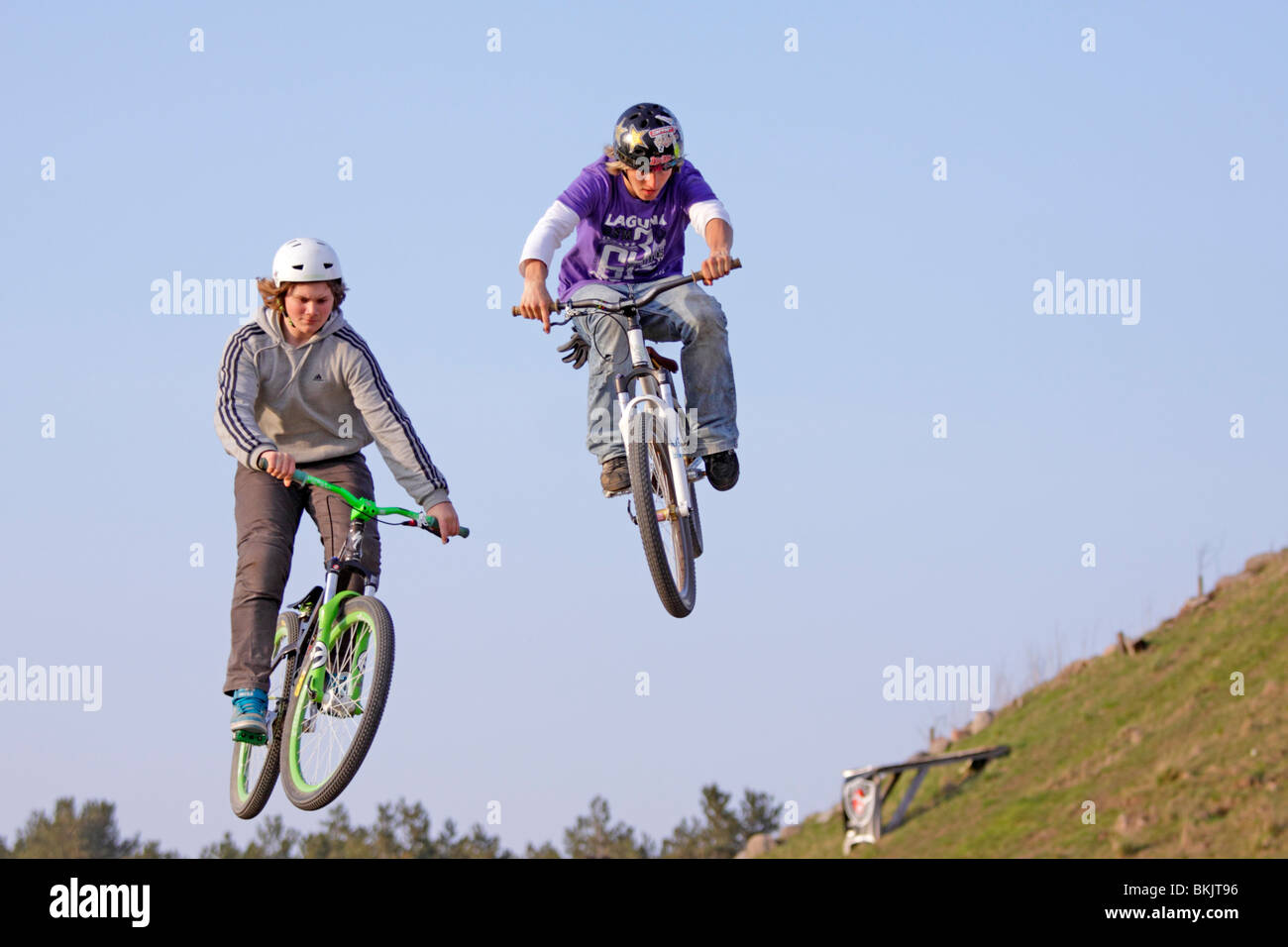 Boys jumping with bikes hi-res stock photography and images - Alamy