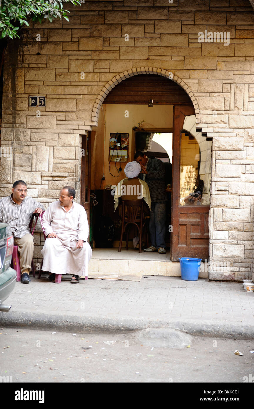 men sitting outside barber shop, islamic cairo , cairo , egypt Stock ...