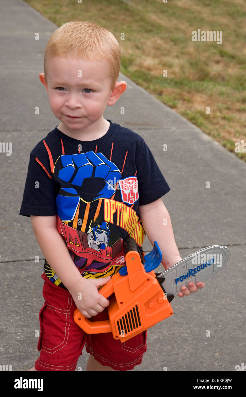 Boy with saw hi-res stock photography and images - Alamy