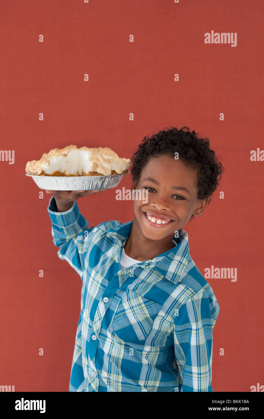 Boy with a Meringue Pie Stock Photo - Alamy
