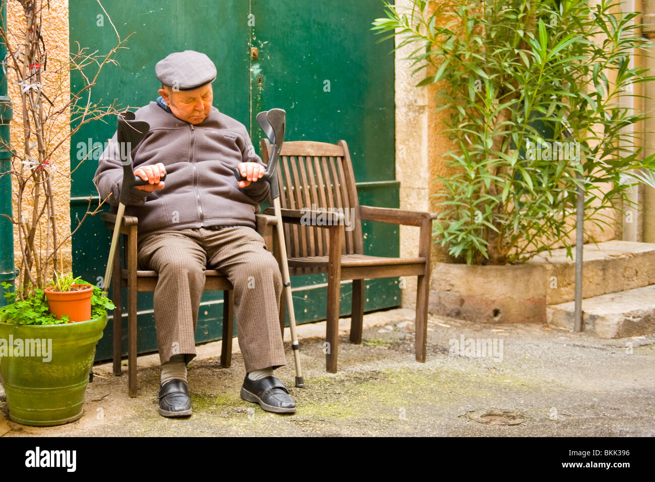 Old man asleep in chair hi-res stock photography and images - Alamy