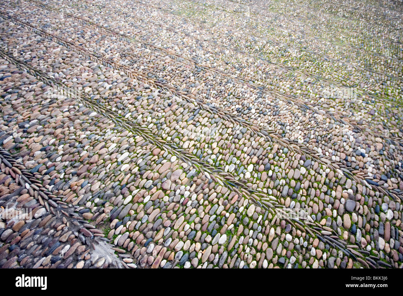 Pebble walkway and pavement Cordoba Stock Photo - Alamy