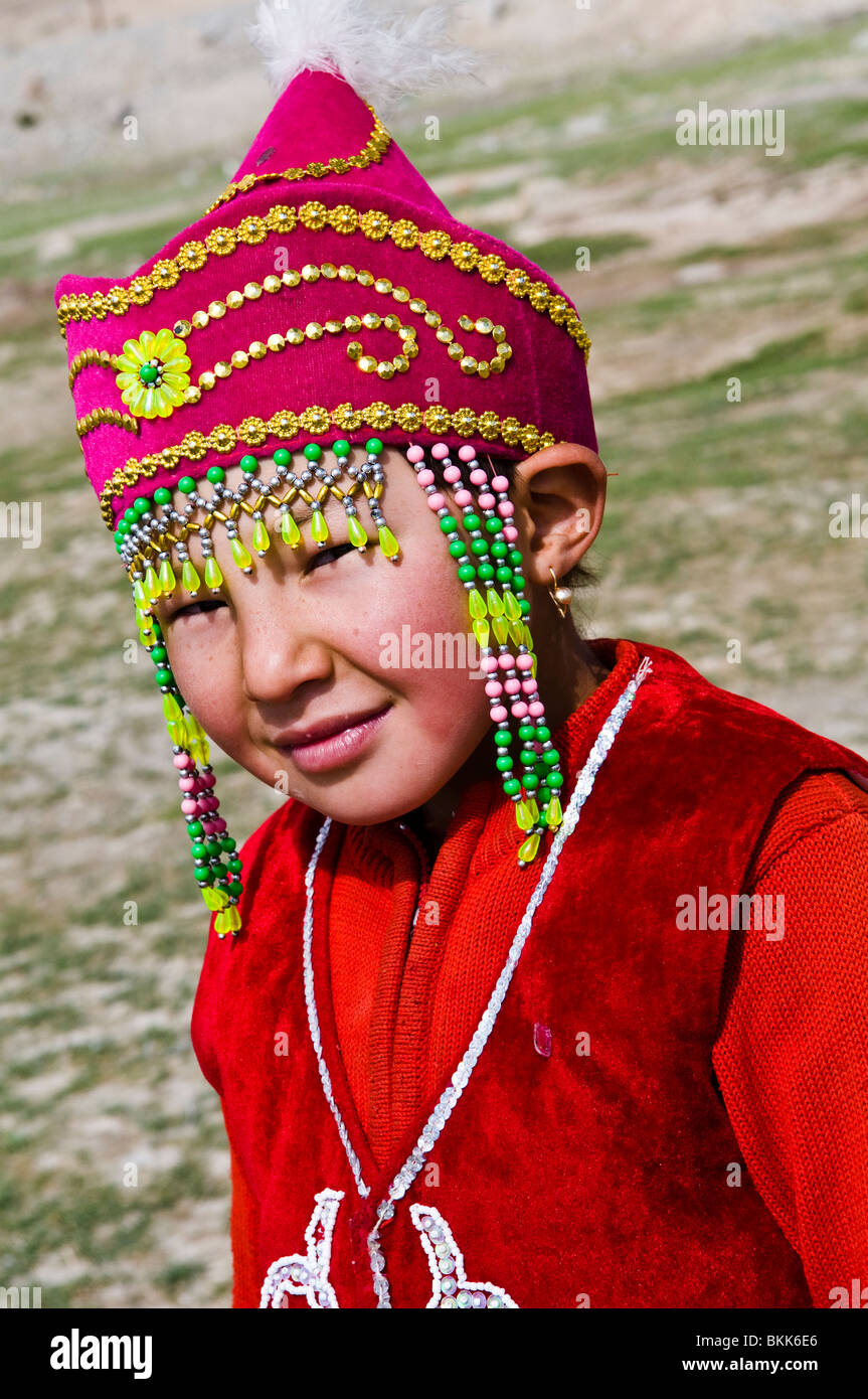 Portrait of a Kirghiz girl wearing a traditional hat Stock Photo - Alamy