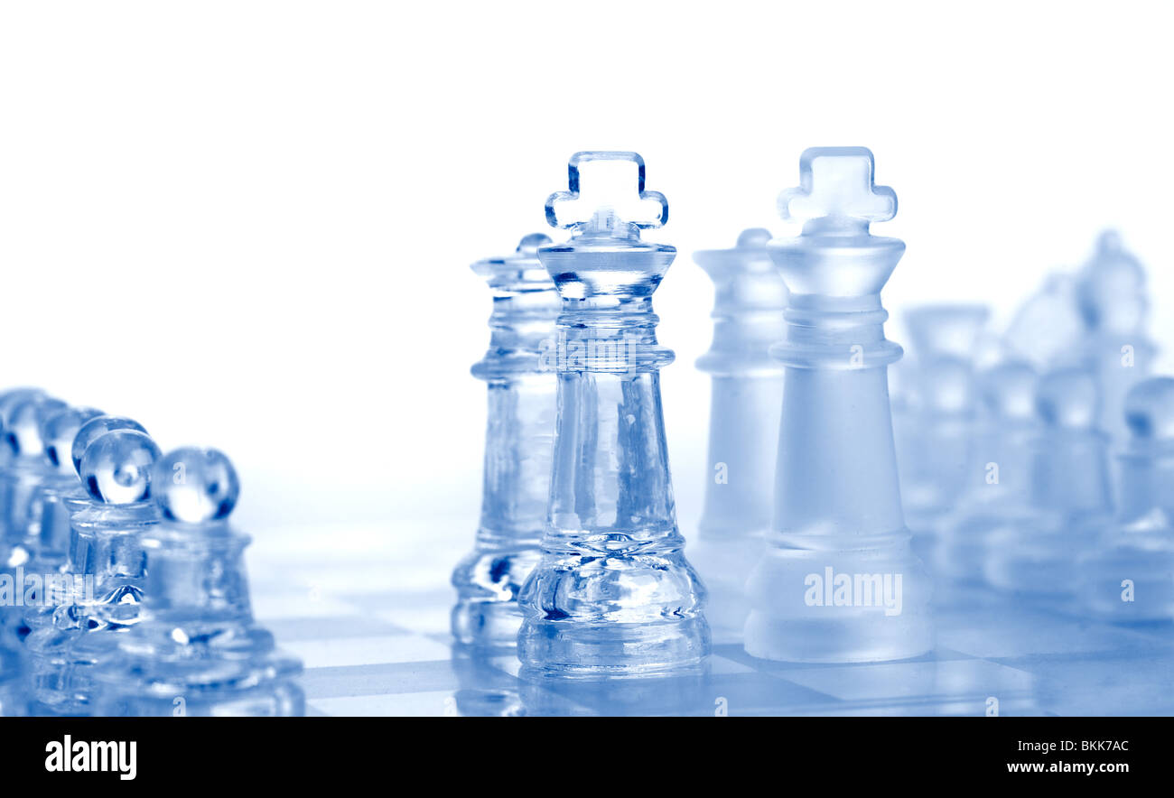 glass chess pieces with blue light Stock Photo - Alamy