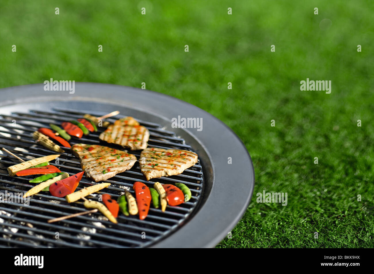 Tuna steaks on a barbecue Stock Photo - Alamy