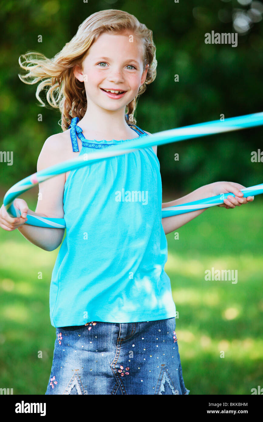 A Girl Using A Hula Hoop Stock Photo - Alamy