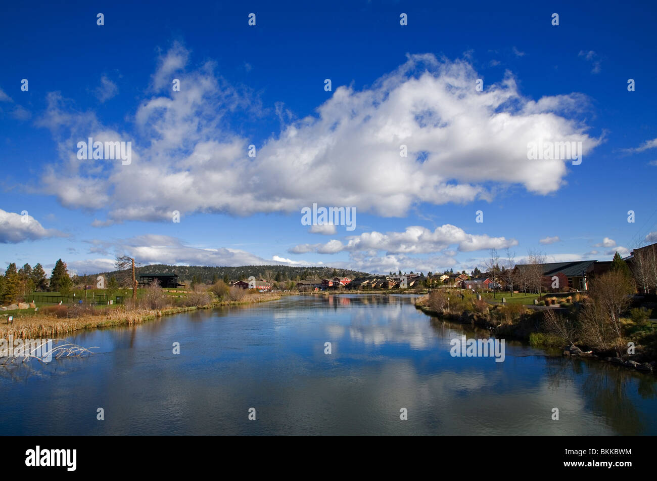 Blue sky and clouds over the deschutes river in bend hi-res stock ...