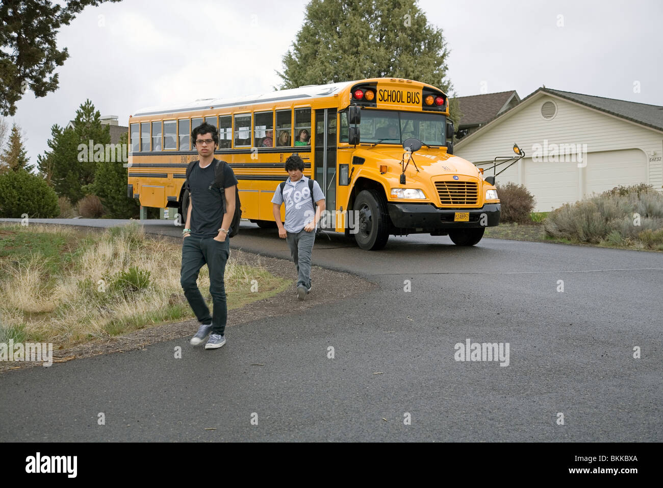 High school students ride a school bus home in the afternoon Stock ...