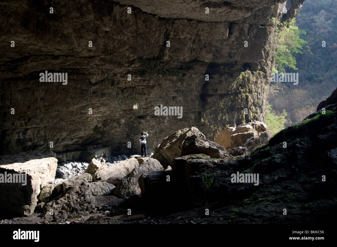 A large cave that is gouged out of the mountains by an underground ...