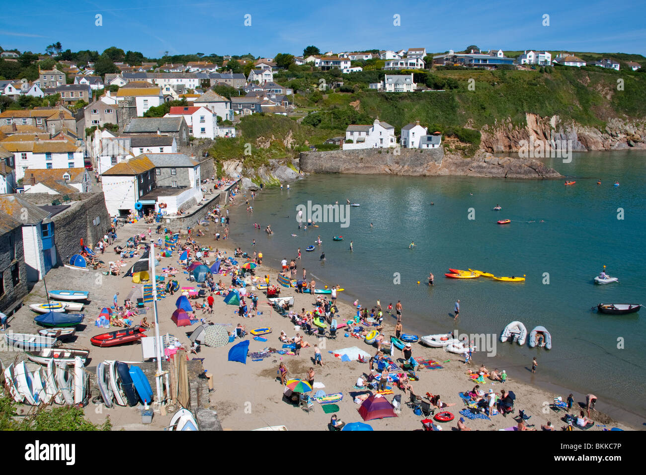Crowds of people on the beach at Gorran Haven Cornwall England Stock ...