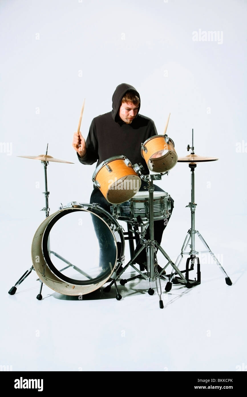 A Young Man Playing The Drums Stock Photo - Alamy