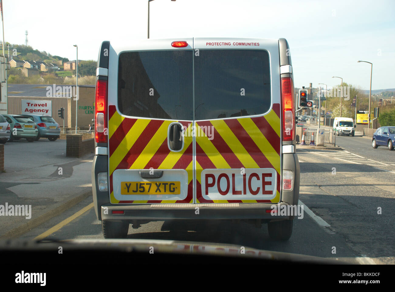 Police van at traffic lights (Chapel Hill, Huddersfield Stock Photo - Alamy