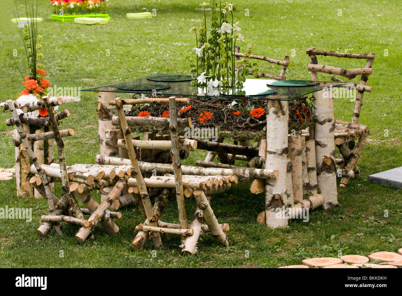 Decorated wooden chairs and table setup Stock Photo - Alamy