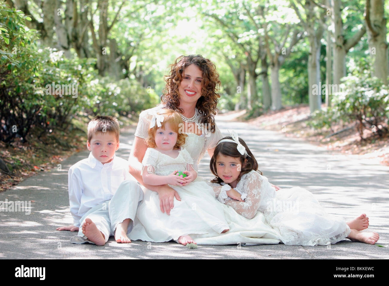 A Mother With Her Three Children Stock Photo - Alamy