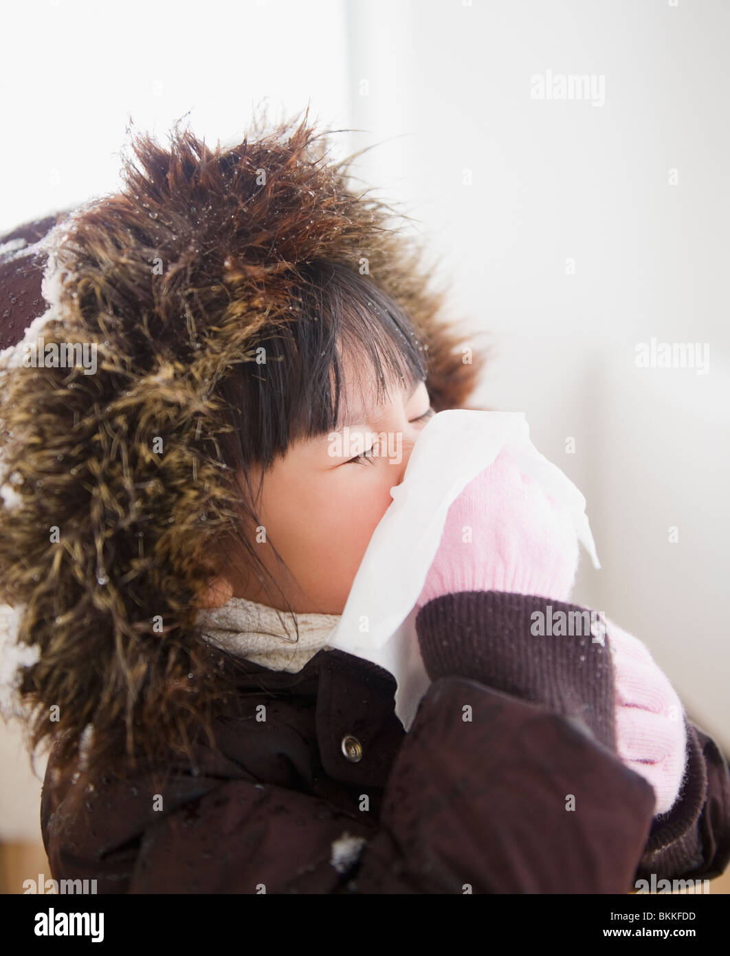 Asian girl blowing nose hi-res stock photography and images - Alamy