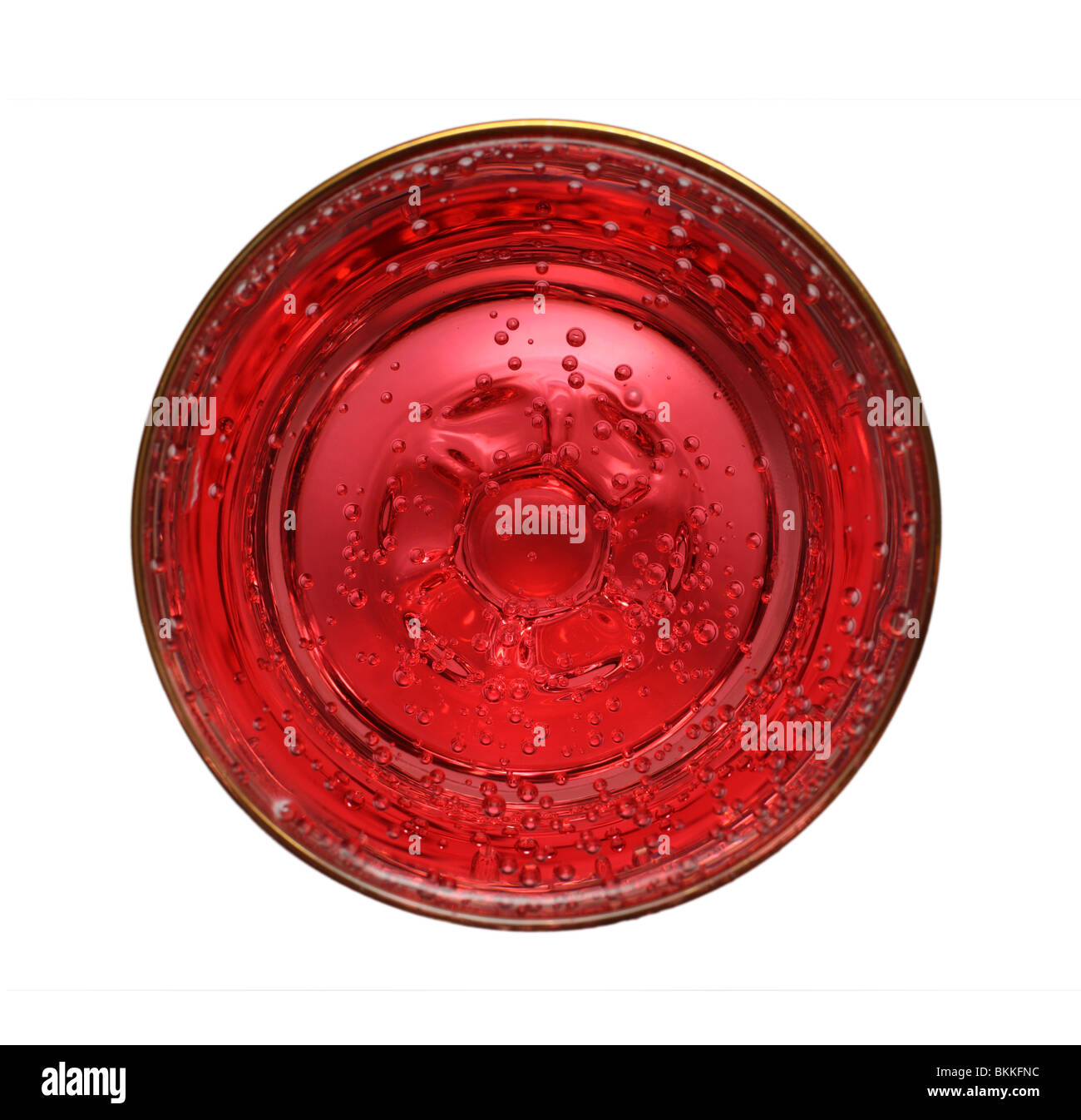 close-up view from above on glass with red aerated water Stock Photo ...