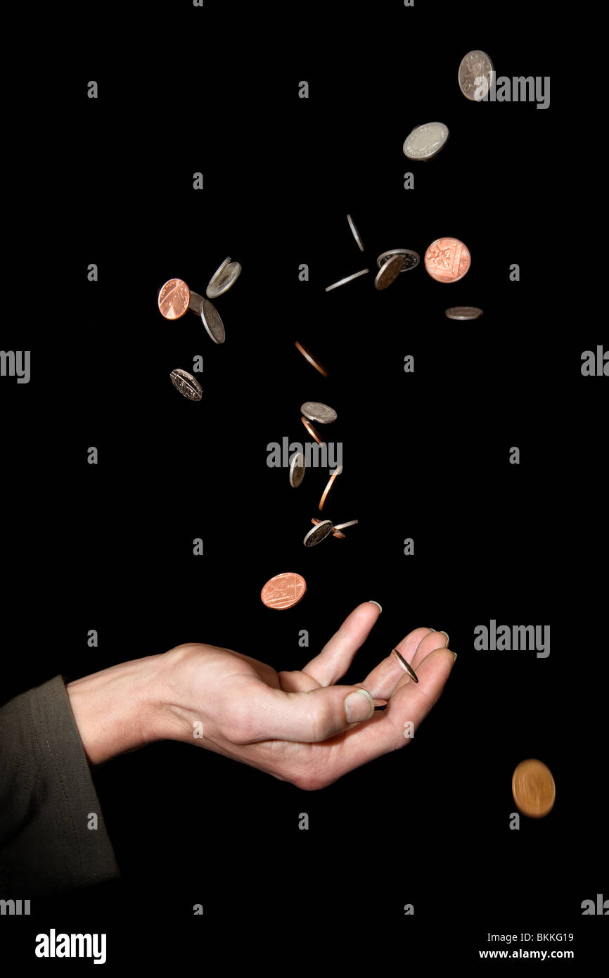 Money falling hi-res stock photography and images - Alamy