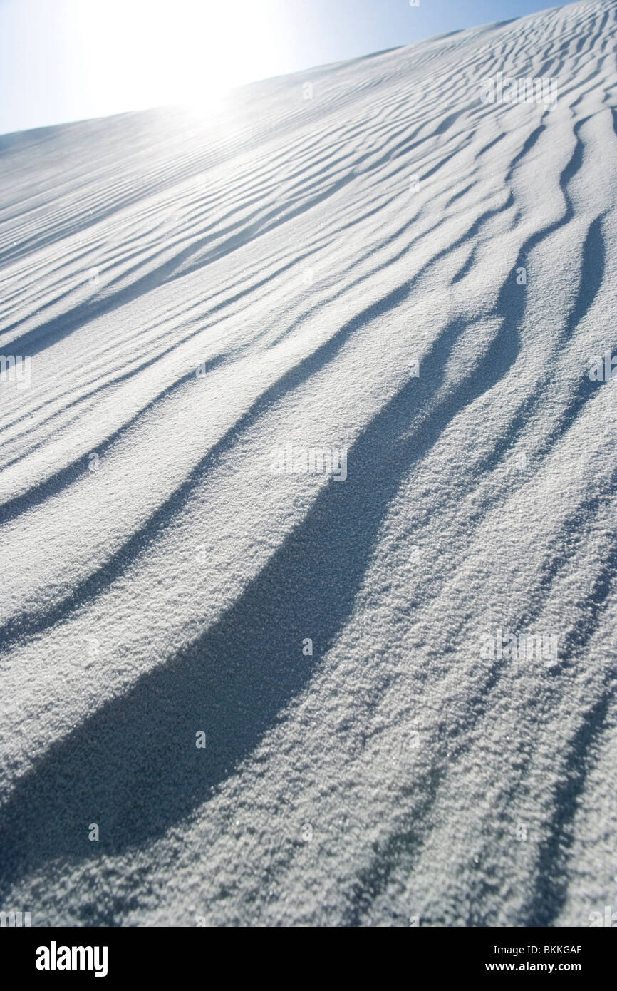 A large ripple-covered dune of white gypsum-ladden sand at White Sands ...