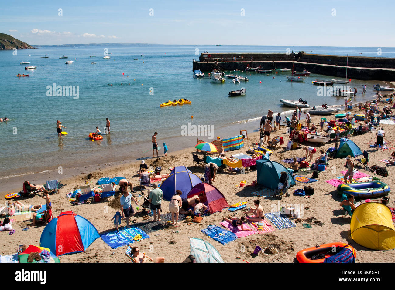 Crowds of people on the beach at Gorran Haven Cornwall England Stock ...