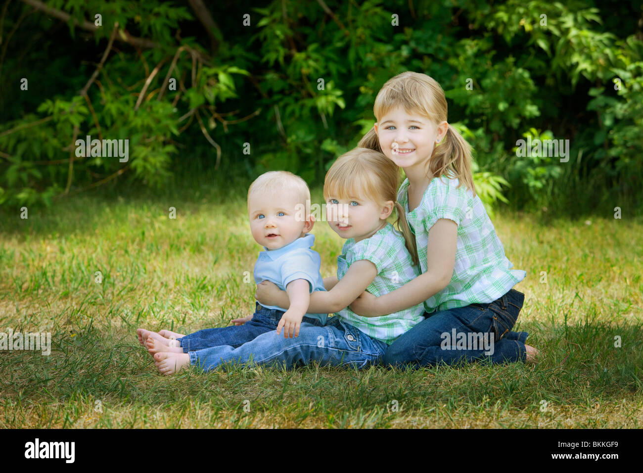 Cute siblings arms around hi-res stock photography and images - Alamy