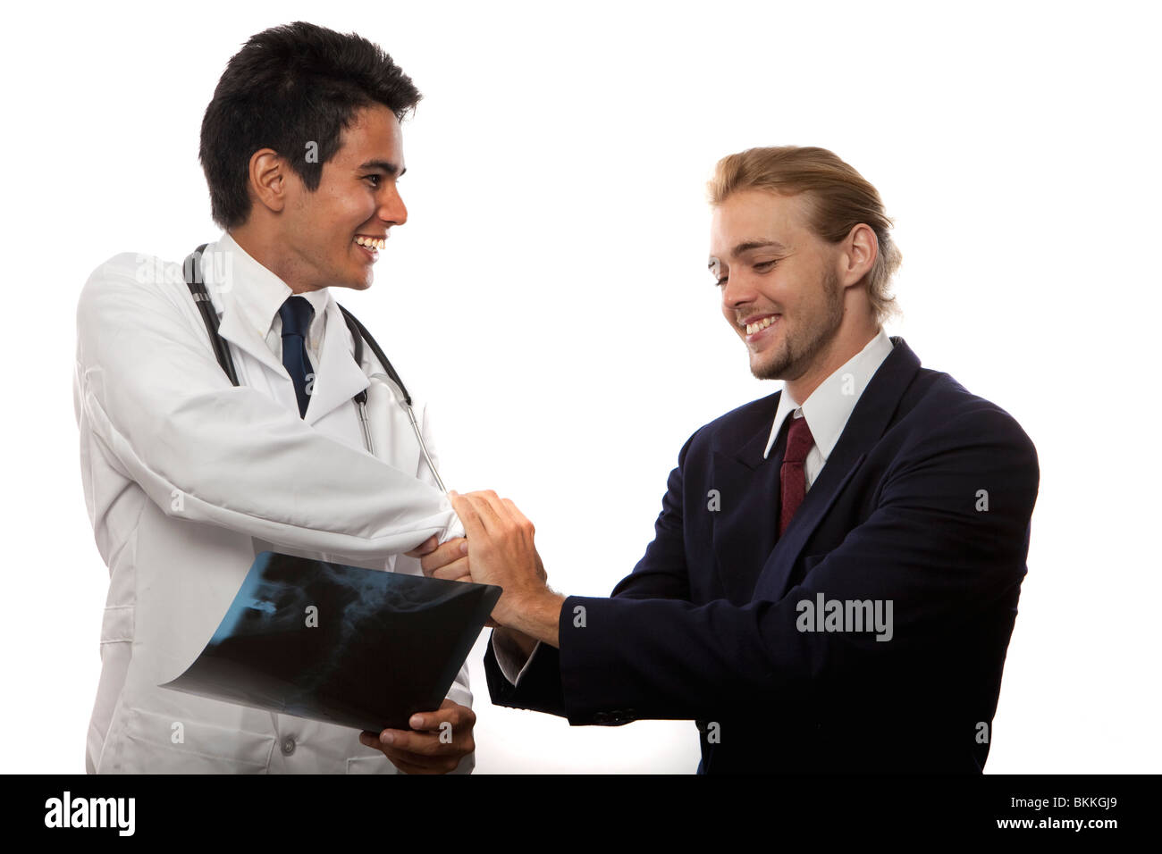 young asian doctor giving good news to his patient about an x-ray Stock ...