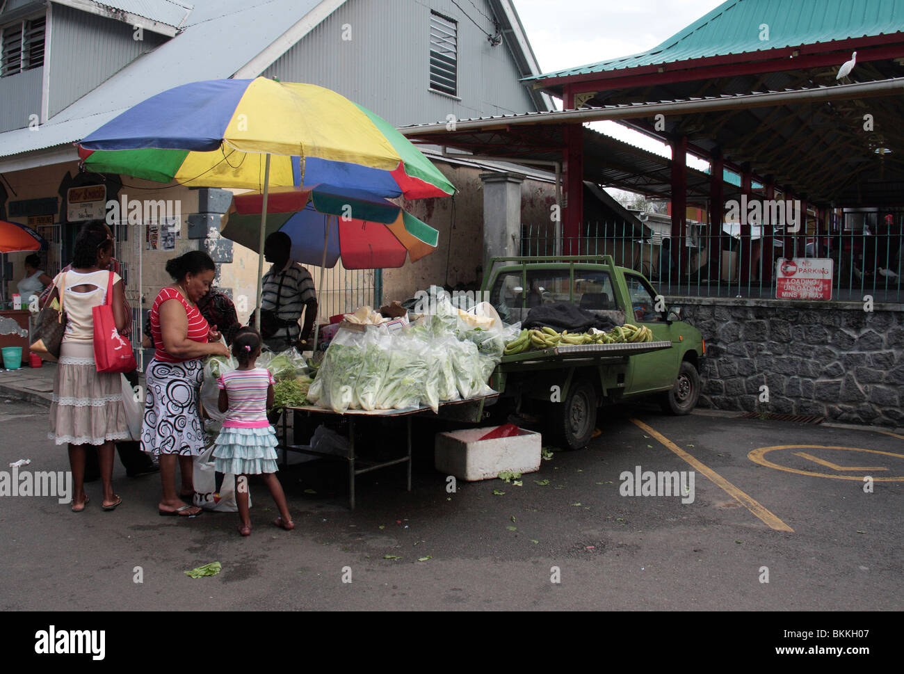 vegetable seller and customers in victoria market,mahe,seychelles ...
