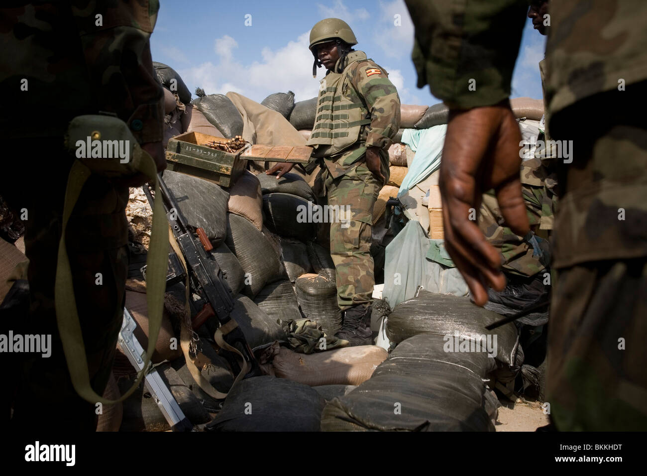 African Union peacekeepers stand guard on an outpost by the ...