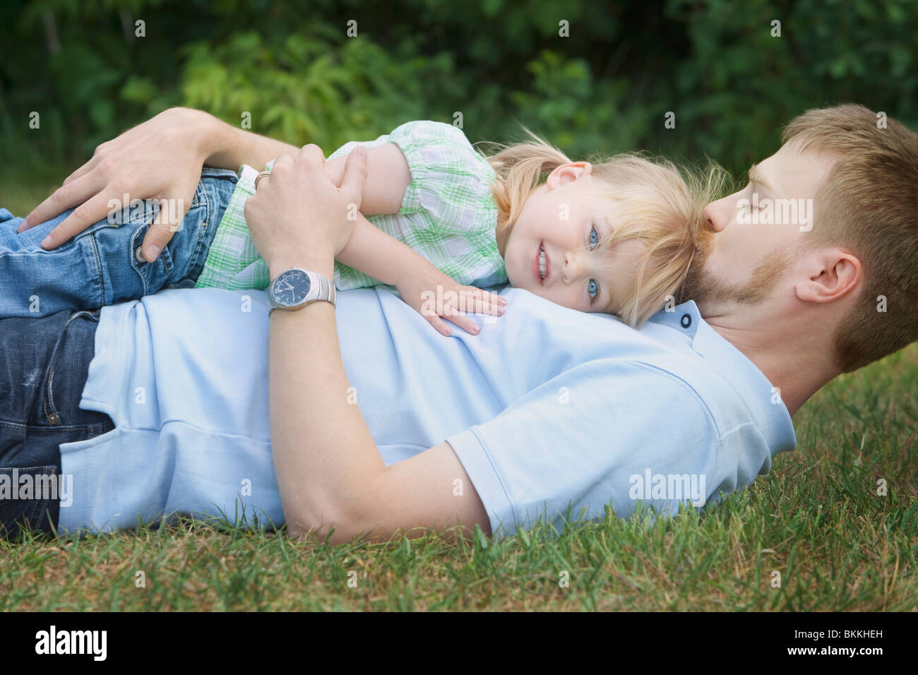 A Father Cuddling With His Young Daughter Stock Photo - Alamy