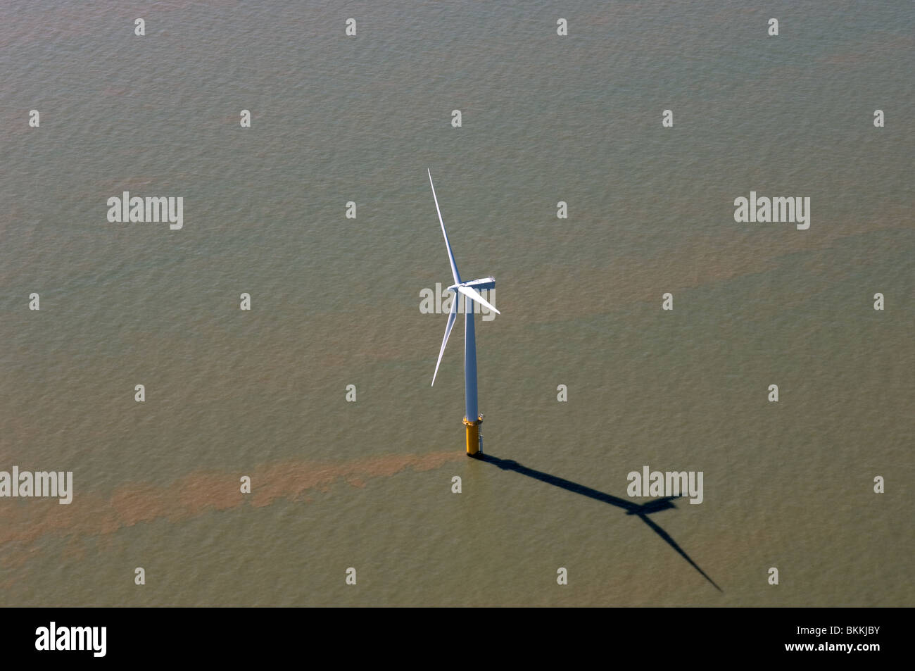 Offshore windfarm turbines at Gunfleet Sands off Clacton, Essex UK in ...