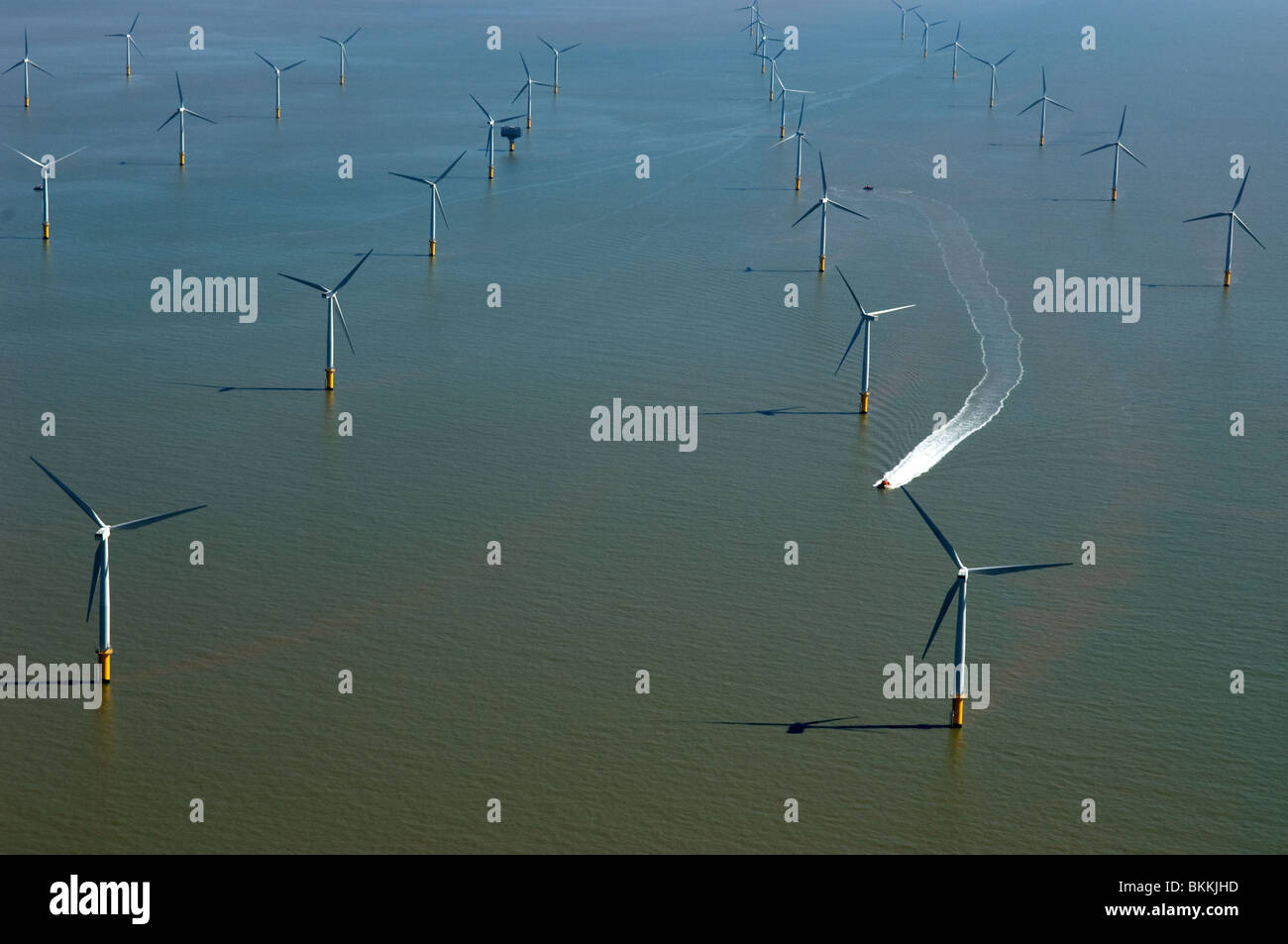 Offshore windfarm turbines at Gunfleet Sands off Clacton, Essex UK in ...