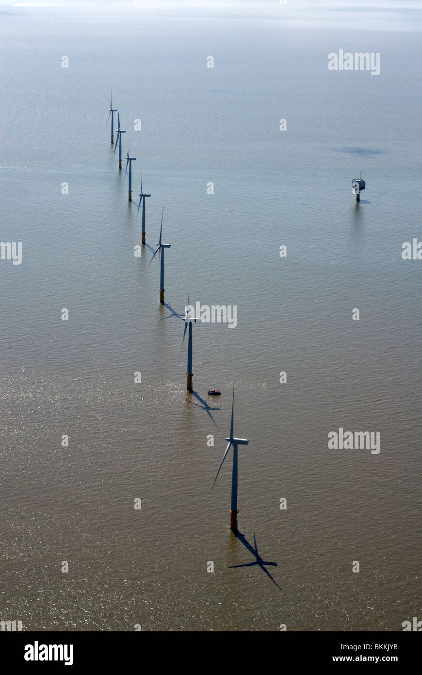 Offshore windfarm turbines at Gunfleet Sands off Clacton, Essex UK in ...