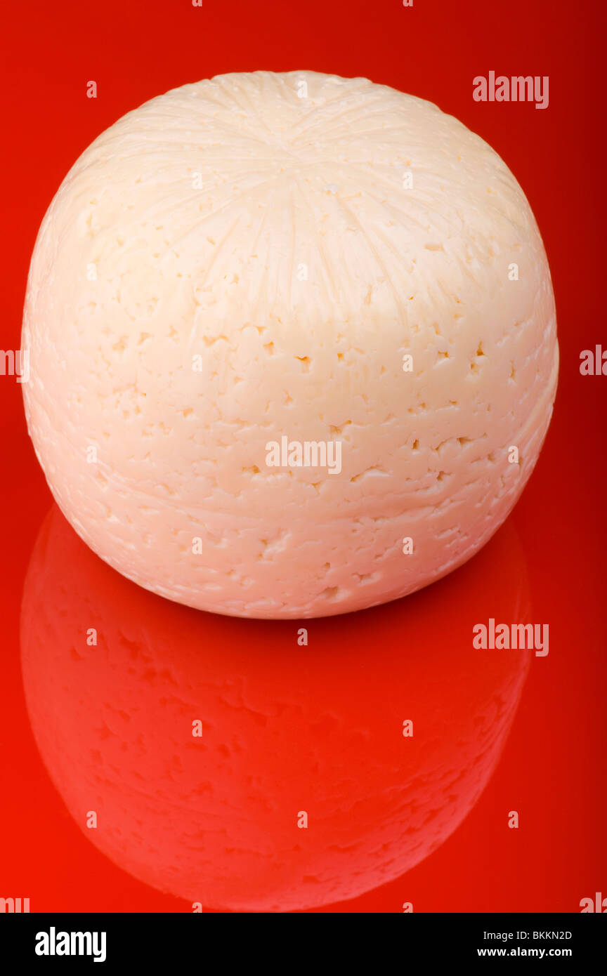 object on red - food cheese close up Stock Photo - Alamy