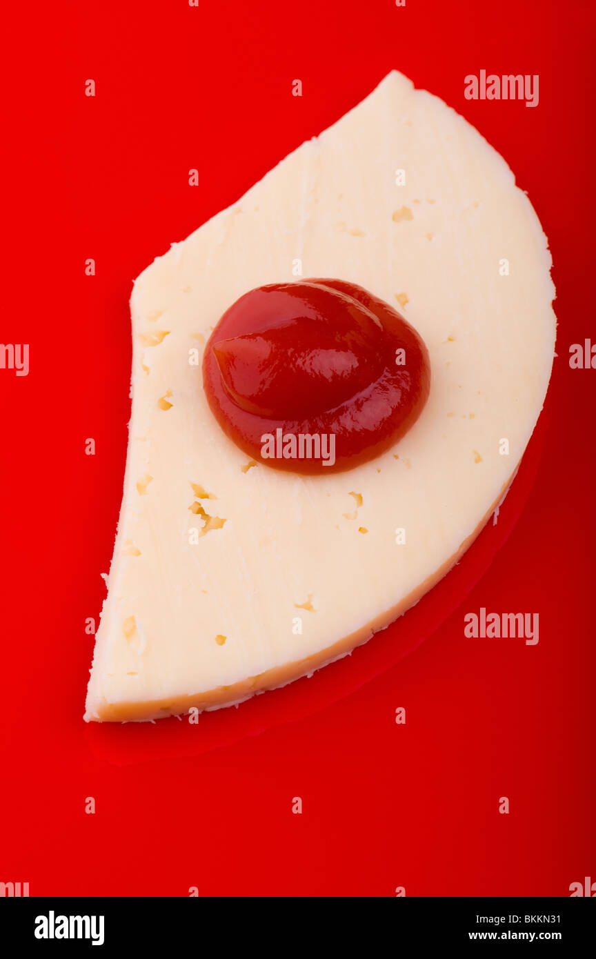 object on red - food cheese close up Stock Photo - Alamy