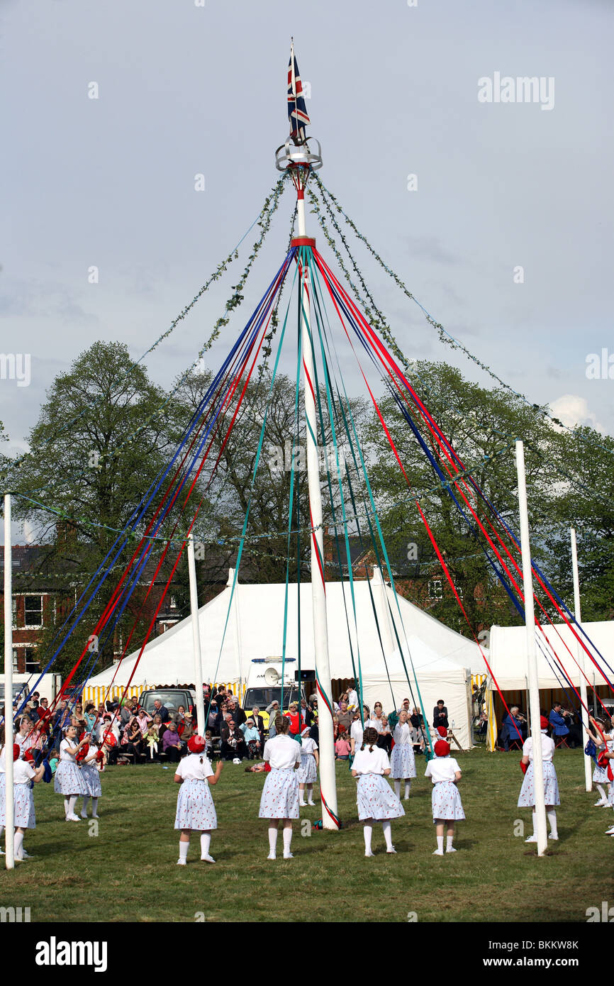Young girls celebrate the ancient Celtic tradition of maypole dancing ...