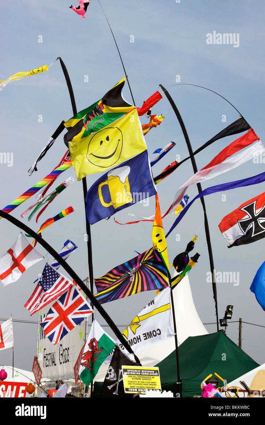 Assorted flags flying at a show ground in England Stock Photo - Alamy
