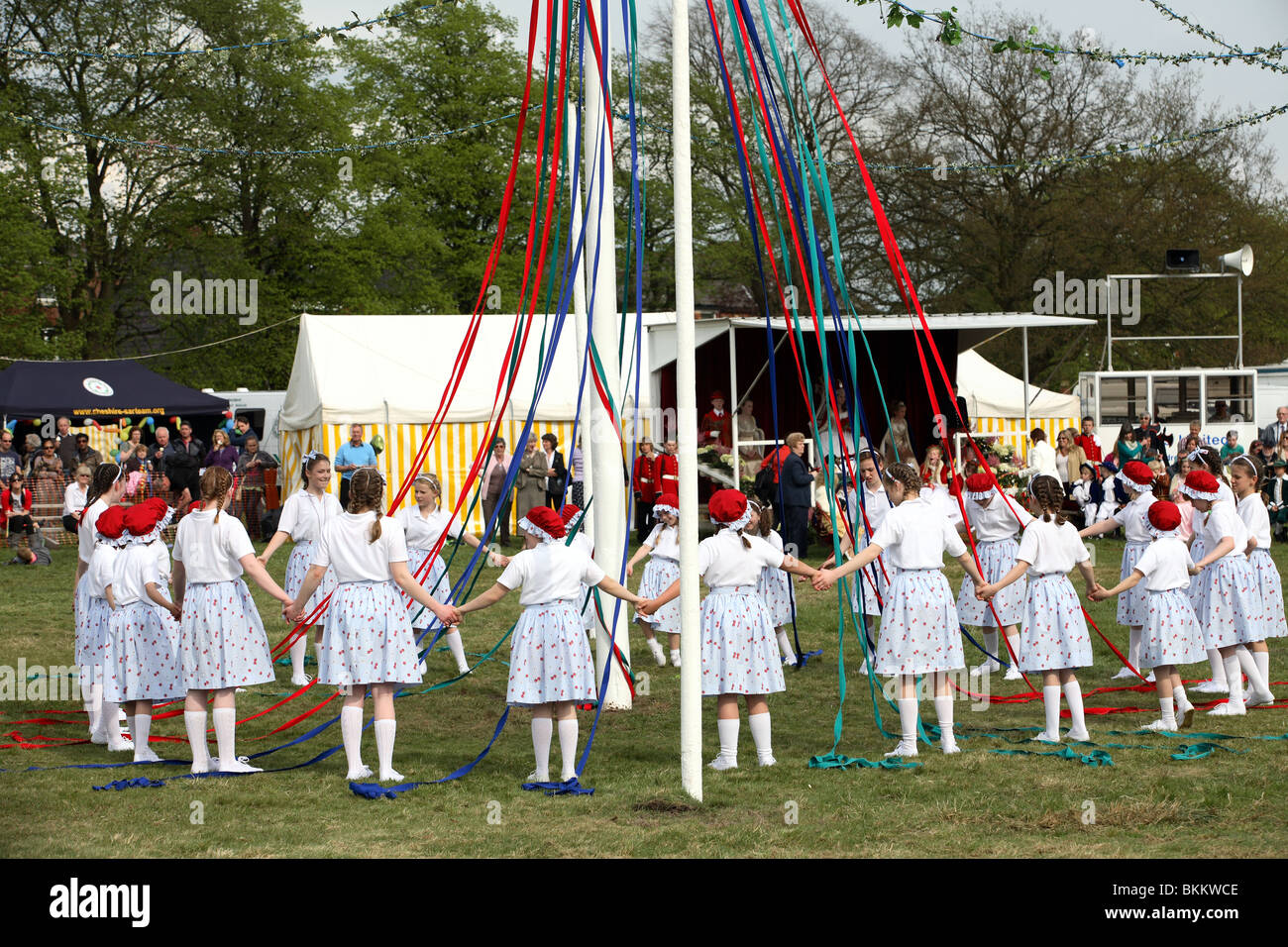 Young girls celebrate the ancient Celtic tradition of maypole dancing ...